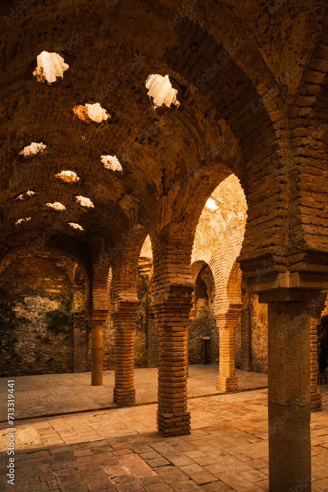 Interior of Arab Baths (Banos Arabes), Ronda, Andalucia, Spain. It is a ...