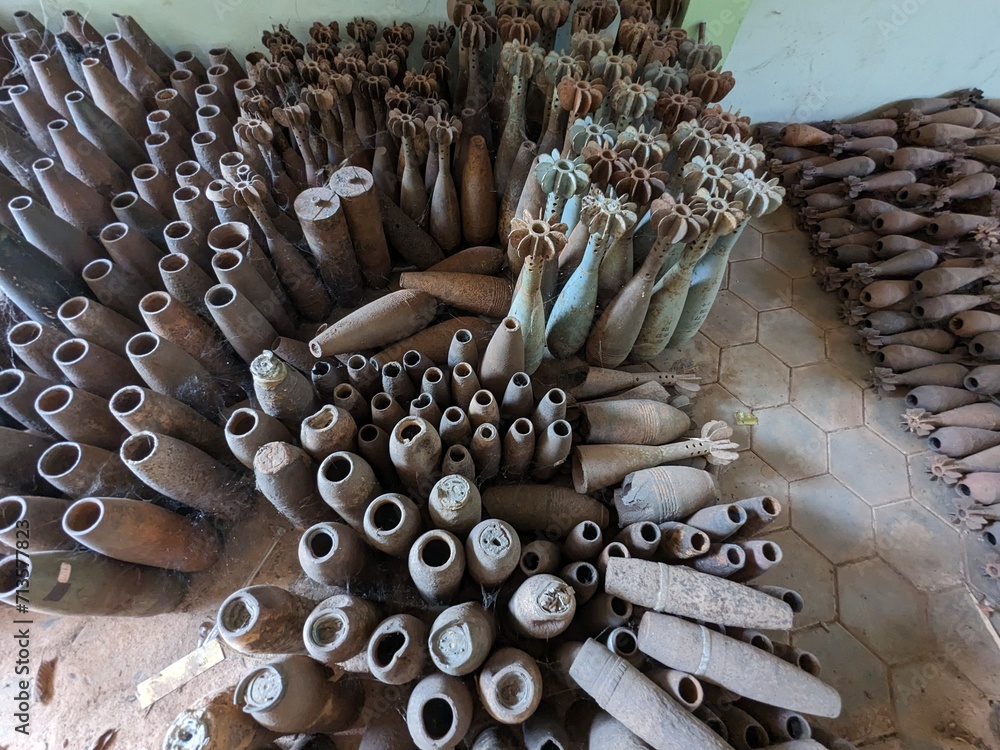 unexploded land mines and cluster bombs remains picked up all around ...