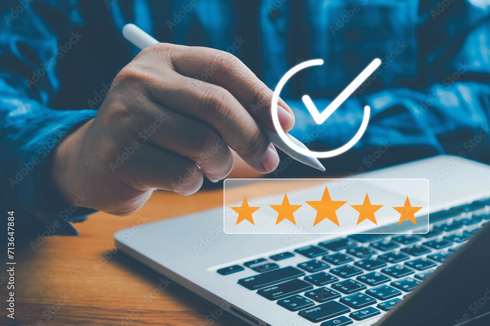 Quality assurance concept, ISO , Businessman holding and showing the best quality assurance with ...