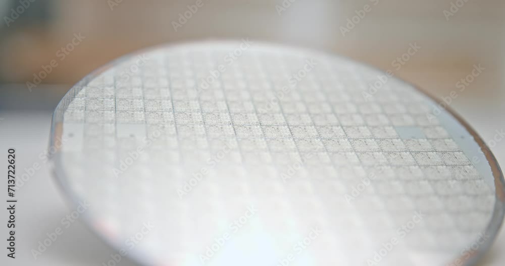A pattern of microprocessor circuits on a silicon wafer. The ...