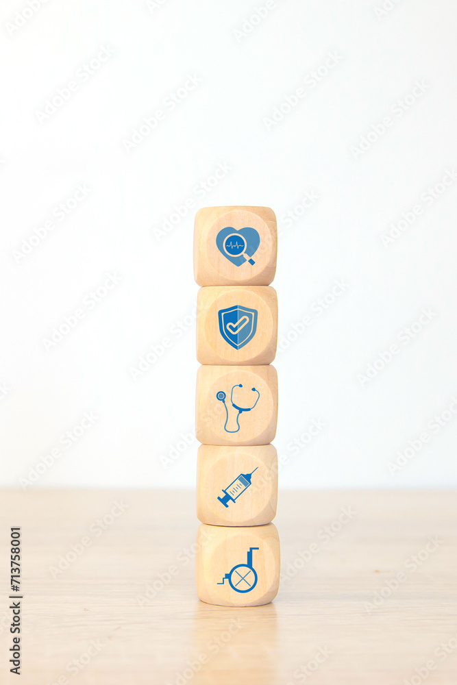 Medical health care concepts on cube wooden block stack of safety ...