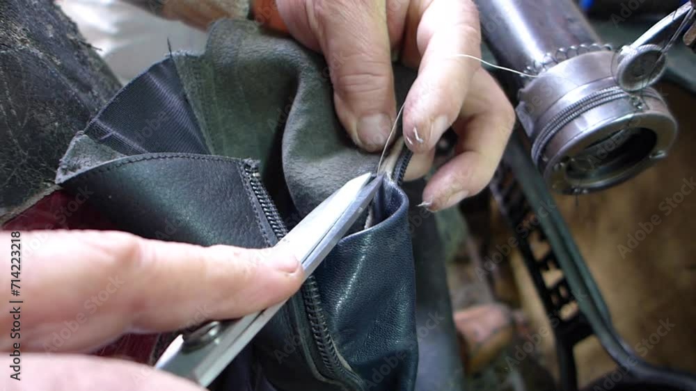 Repair of old shoes at a craftsman specialized in repairing all types ...