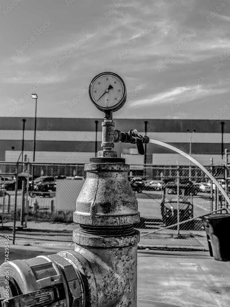 soil vapor extraction test well header with pressure gauge and sample ...