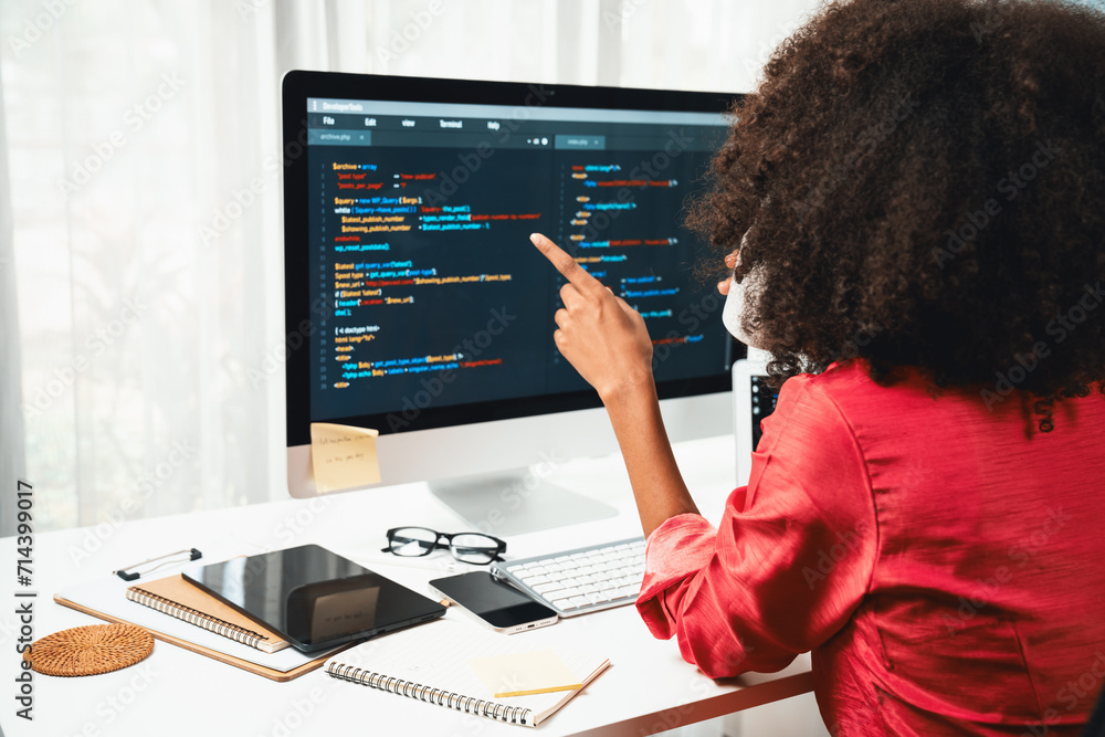 Young working African woman creating coding website developer, thinking data information ...