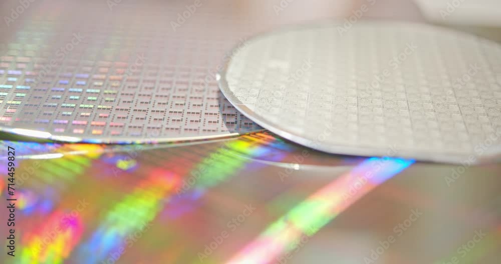 A close-up view of a silicon wafer's microprocessor circuit layout. The ...