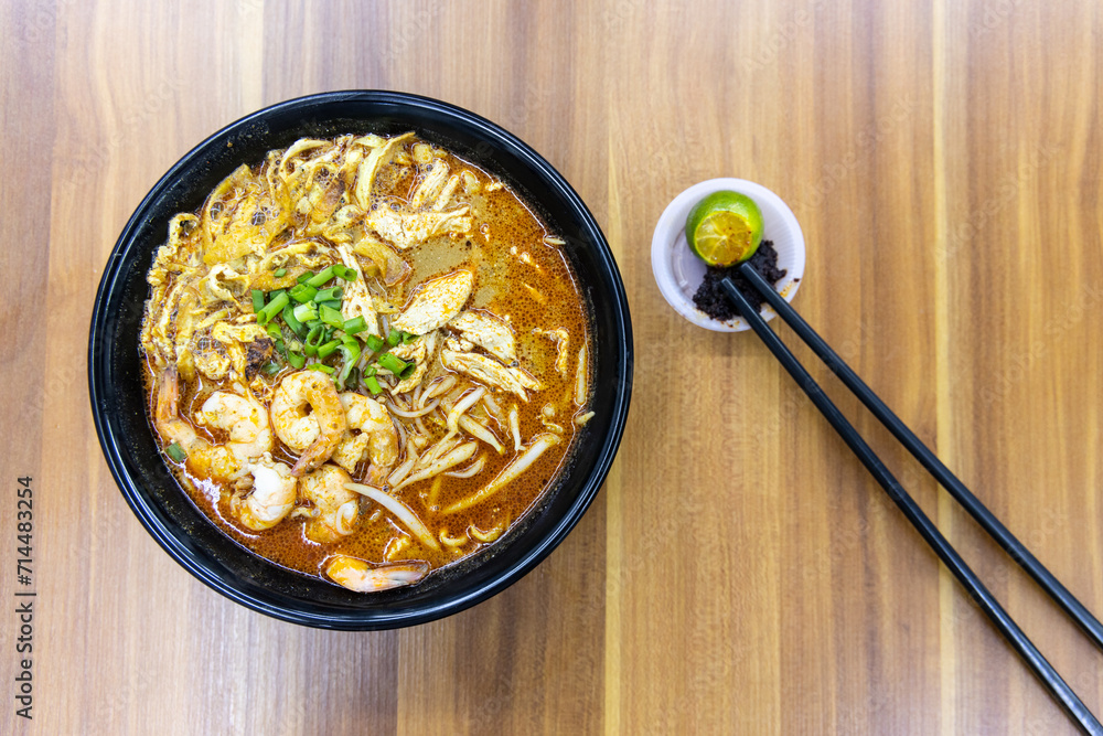 Top Down View Of No Frills Simple But Delicious Sarawak Laksa Noodle Soup Served With Shrinps In