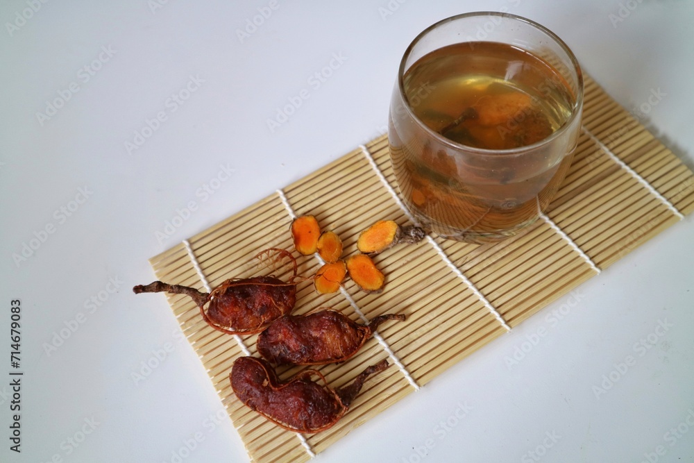 Asam jawa and kunyit or tam. Ussually used to make indonesian ...