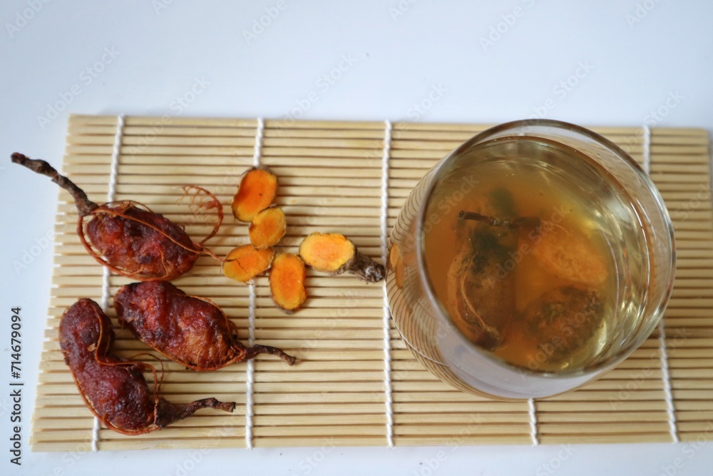 Jamu Kunir Asem is is a traditional Javanese herbal drink made from ...