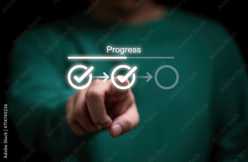 Businessman touching to tick correct mark in checklist with progressive ...