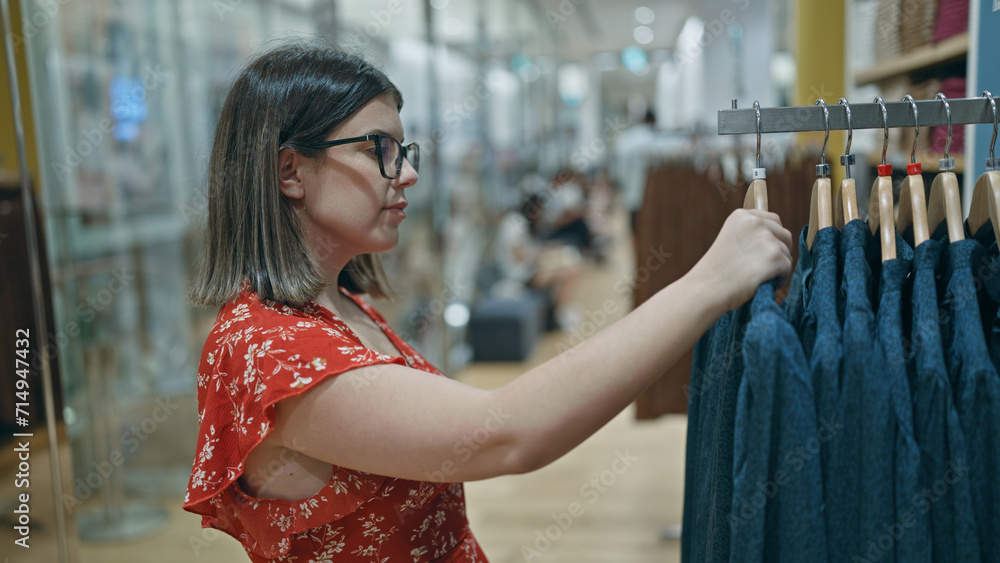 Fashion passion! beautiful hispanic woman with glasses choosing chic ...