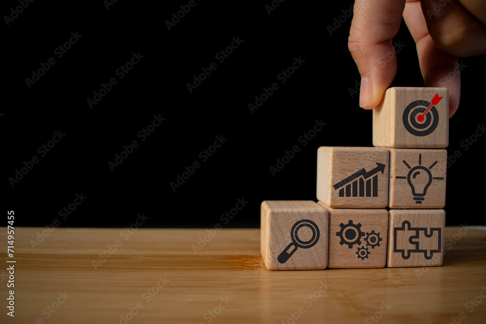 Business goal, plan. wooden cubes with icon business strategies, action ...