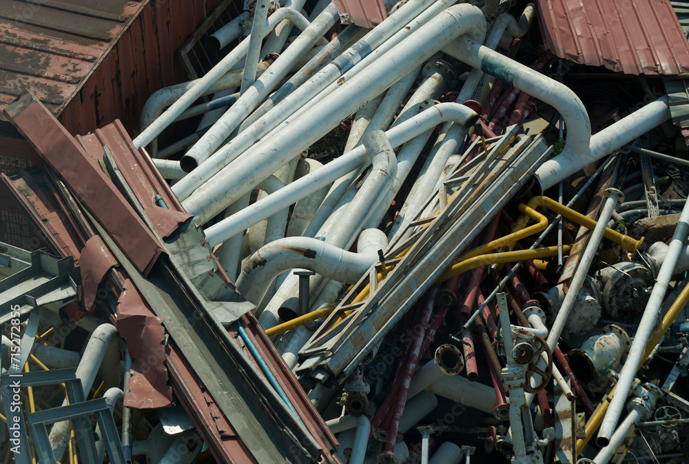 Old building pipes and tubes ready for recycling after dismantling from ...