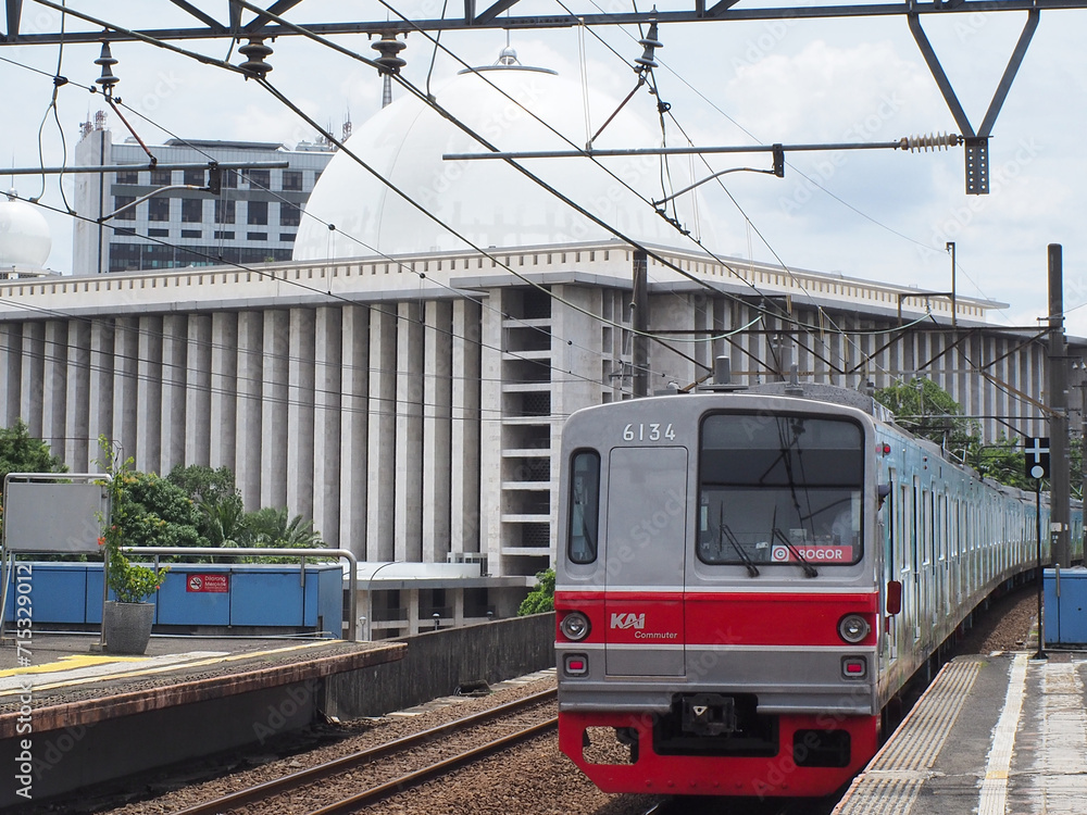 Commuter line, electric train PT. KAI in Juanda Train Station, with ...