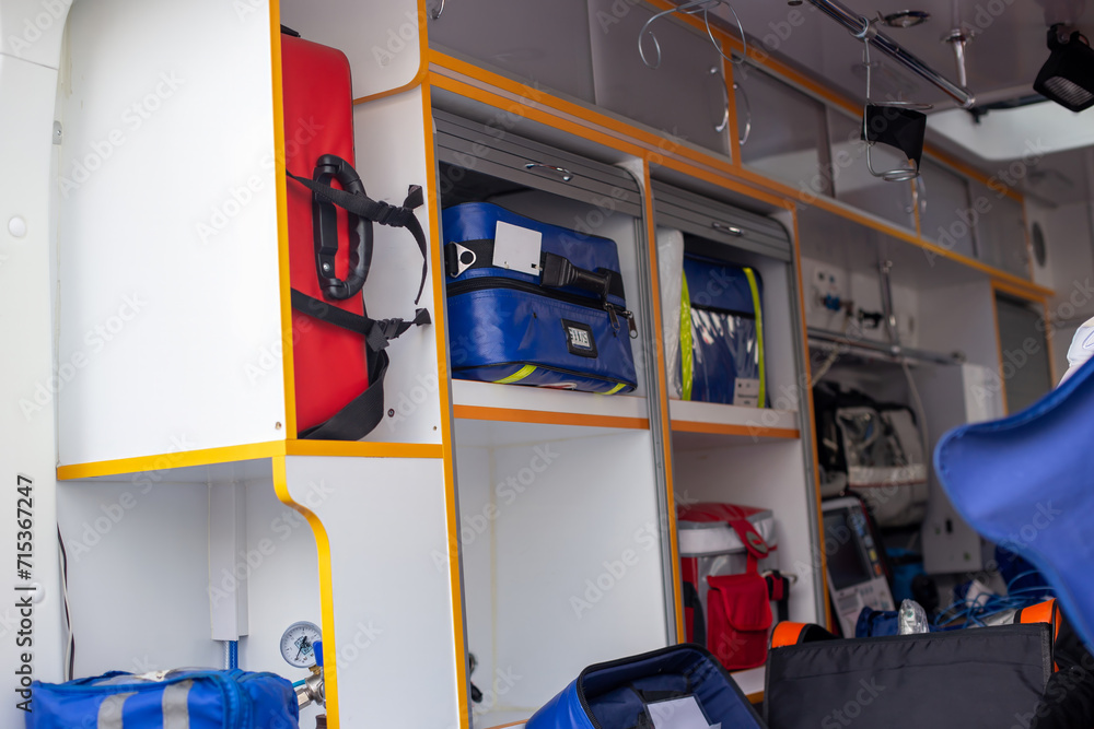 Inside of an ambulance showing medical supplies and storage ...