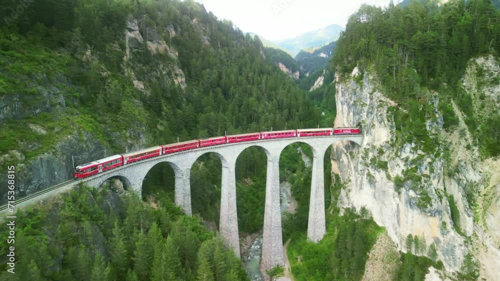 famous Glacier Express red swiss train on Landwasser viaduct bridge in ...