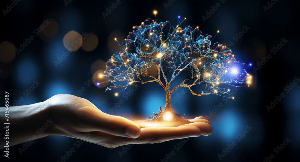 Hand holding or touching with glowing digital network tree glowing on ...