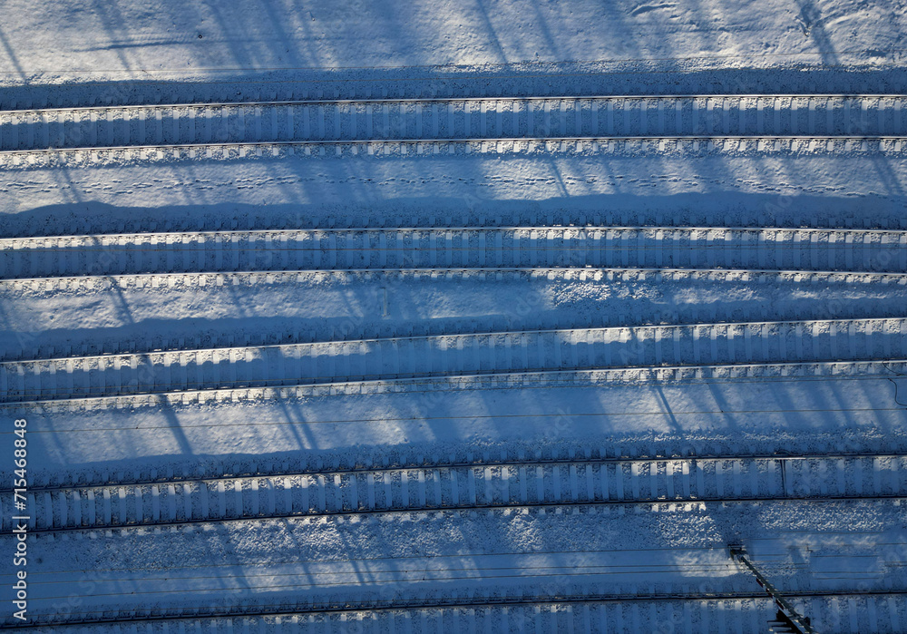 railway tracks to a multi-track sorting train station. vertical view ...