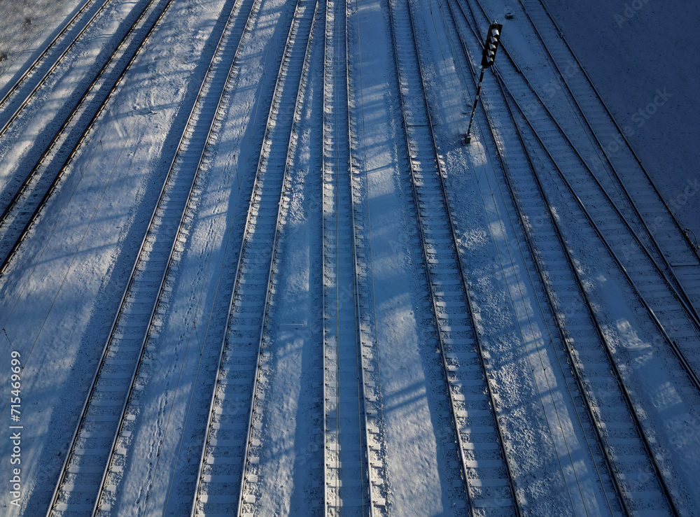 railway tracks to a multi-track sorting train station. vertical view ...