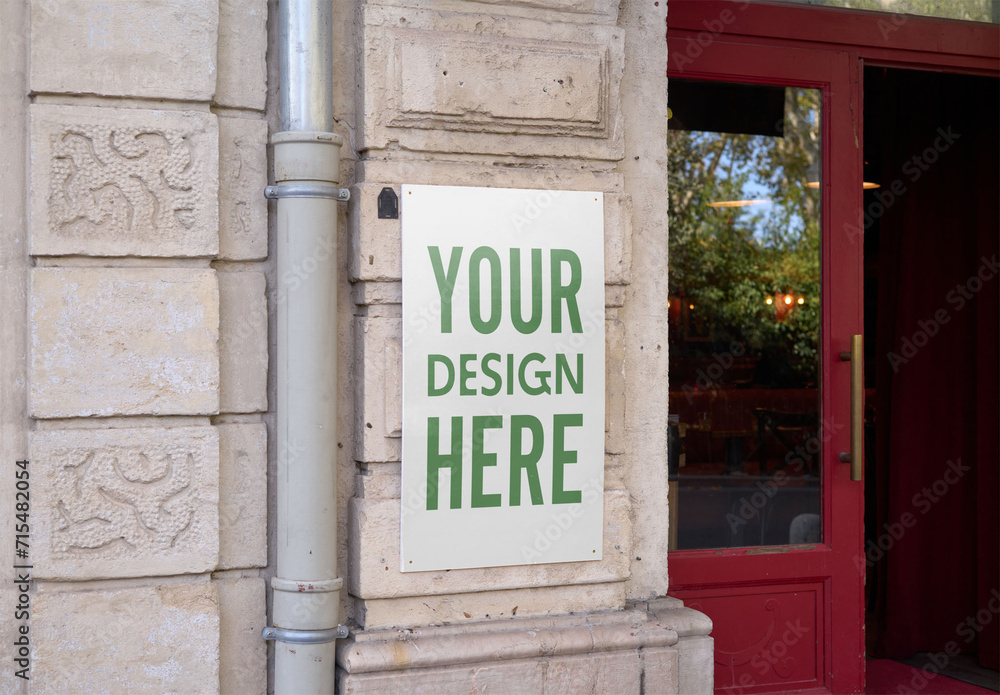 Mockup of customizable sign on stone building Stock Template | Adobe Stock