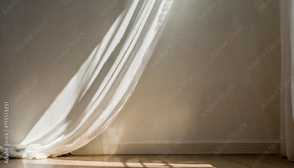 light and shadows lines from curtain and silates on the white wall ...