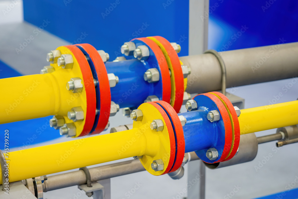 Pipes at chemical plant. Double pipeline with flanges connections ...