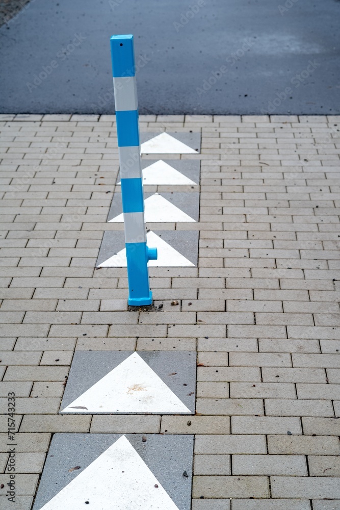 Cycle path with pole and sign on the ground Stock Photo | Adobe Stock