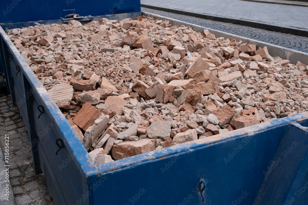 Shattered, broken wall bricks, construction waste after building ...