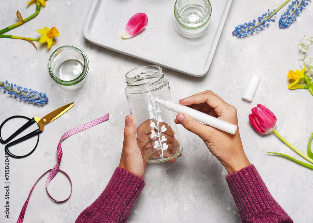 Step 2. Paint a plant motif on a glass jar with white acrylic painter ... Step 2. Paint a plant motif on a glass jar with white acrylic painter ...