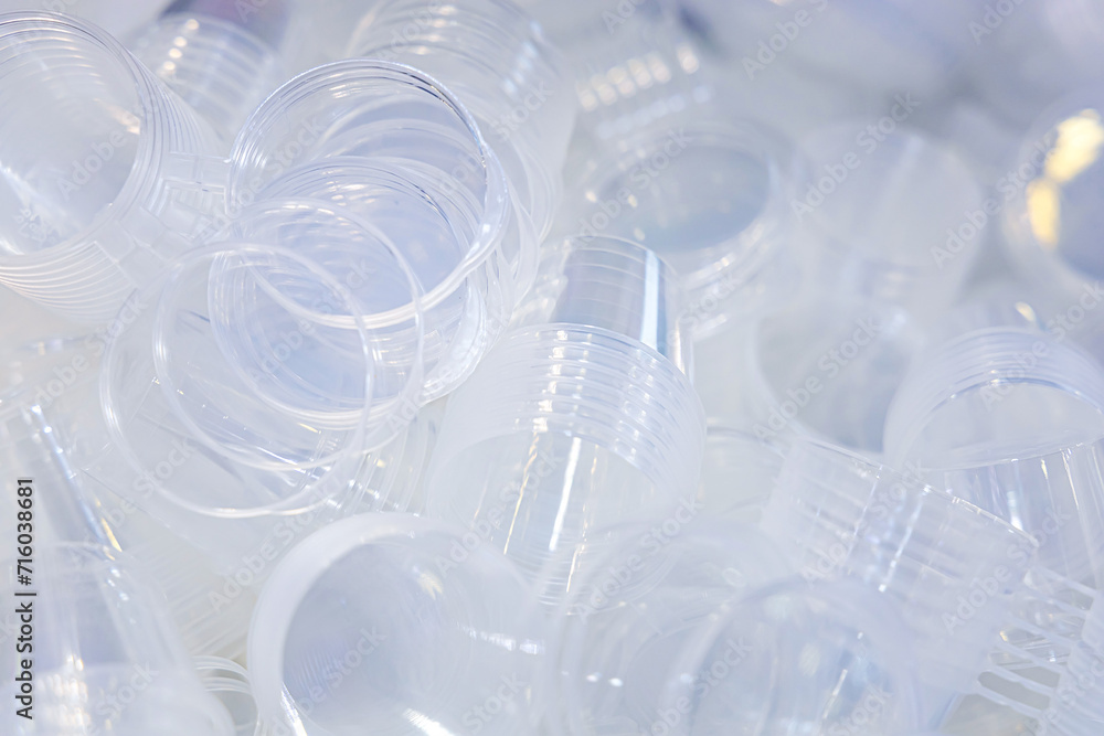 Mass production of packaging. Transparent plastic containers with a lid ...