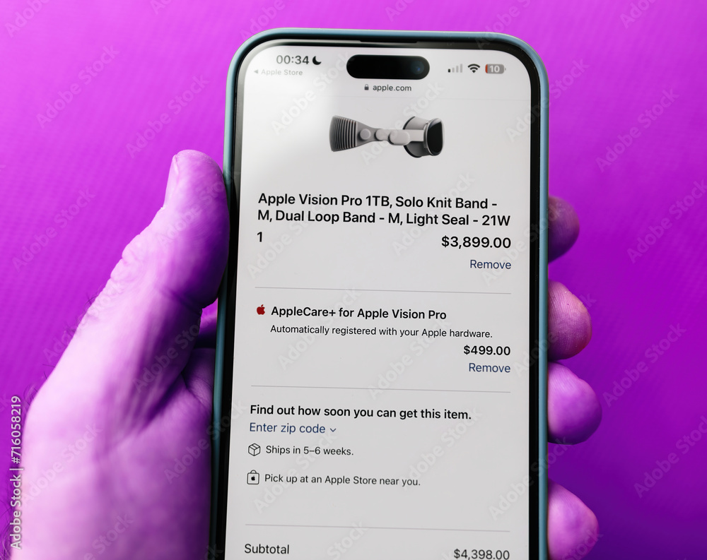 California, USA - Jan 21, 2024: A male hand holds the new iPhone 15 Pro during the ordering ...