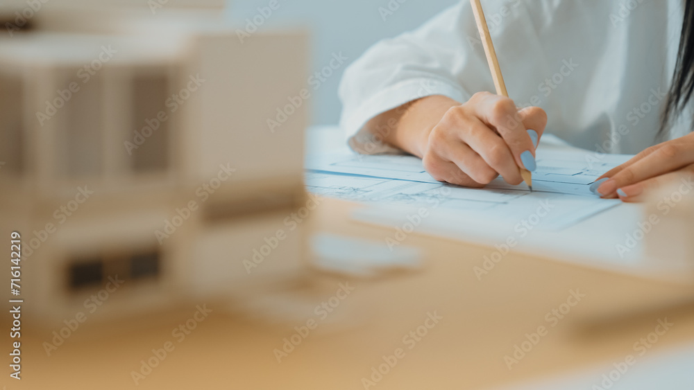 Closeup of beautiful young architect engineer hand drawing, drafting ...