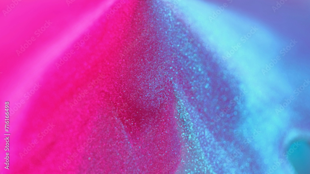 Glitter pyramid. Paint spill. Defocused neon pink blue color glowing ...