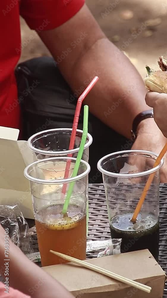 Intimate candid moment of a Filipino family eating and sharing food ...