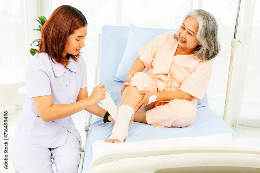 Female nurse care elderly female patient hospitalized patient with ...
