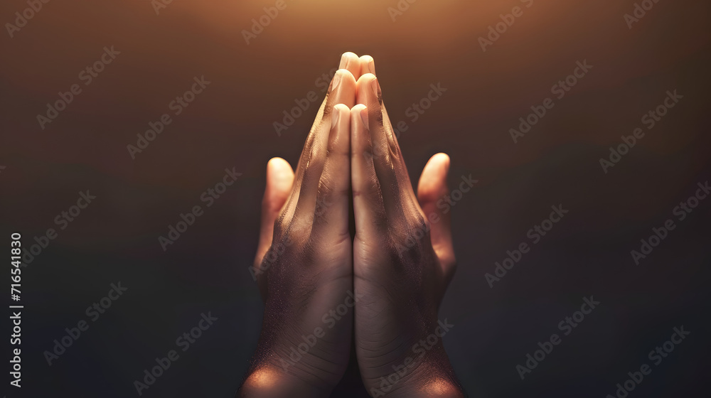 Praying hands with faith in religion and belief in God on dark ...