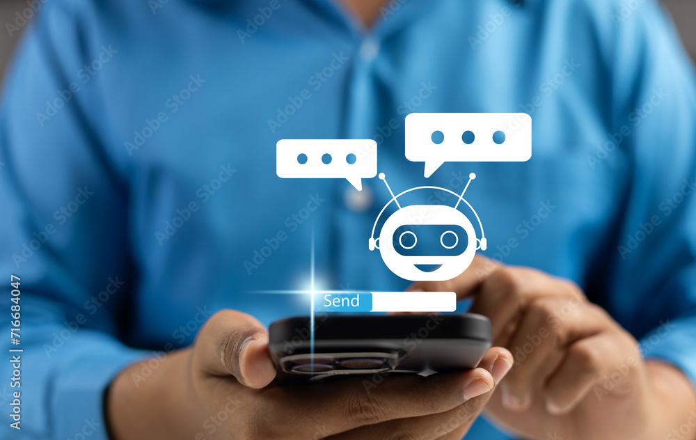 Businessman using AI chatbot conversation assistant in app on device ...