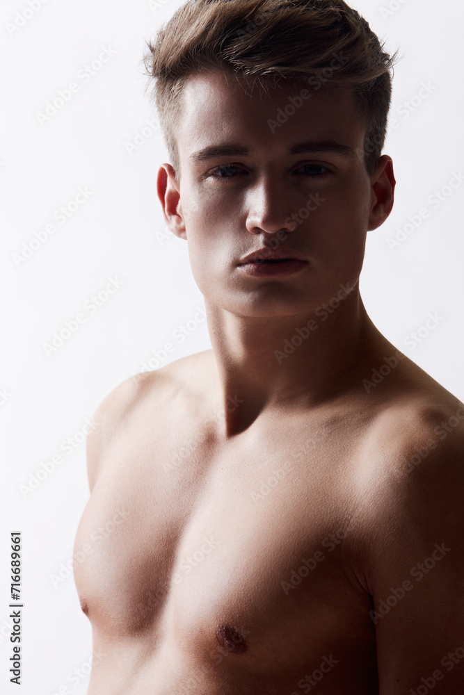 Portrait, natural and masculine with body of man in studio on white ...