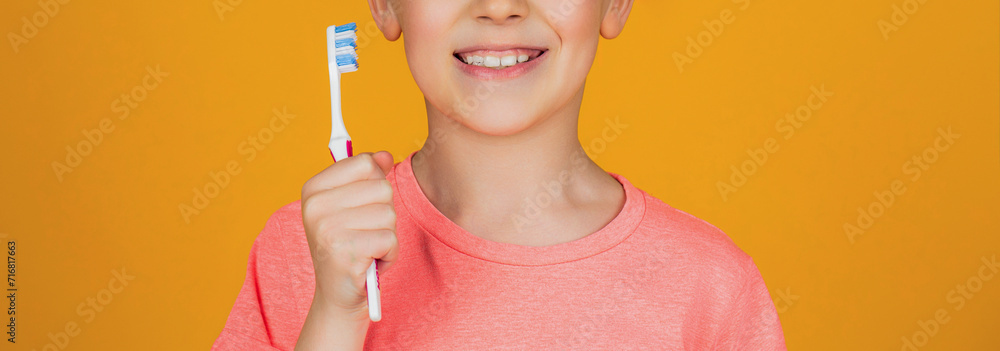 Boy toothbrush white toothpaste. Health care, dental hygiene. Joyful ...