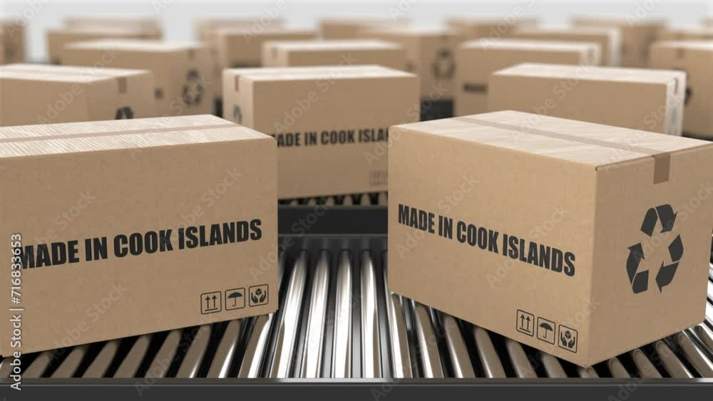 Cardboard boxes with Made in Cook Islands text on roller conveyor ...