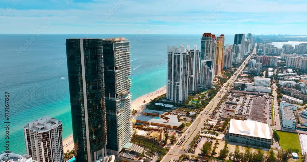 Skyscrapers built in row on the shore of the Atlantic Ocean ...