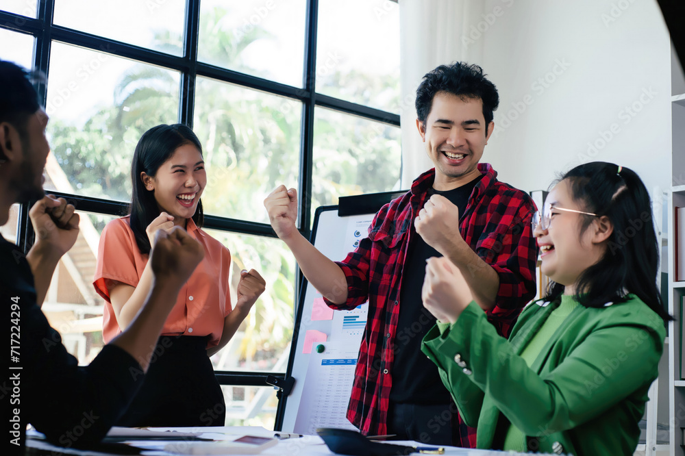 Happy diverse business team celebrating success and having fun all together, Celebration in the ...