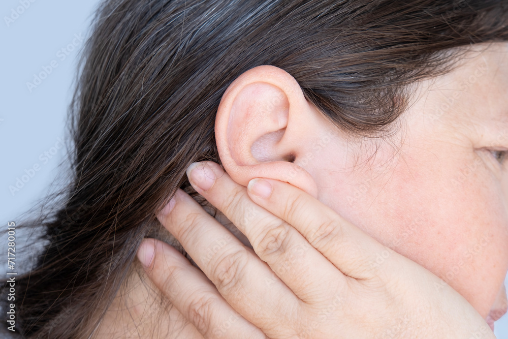 caucasian mature woman holding painful ear, ear Inflammation, hearing ...