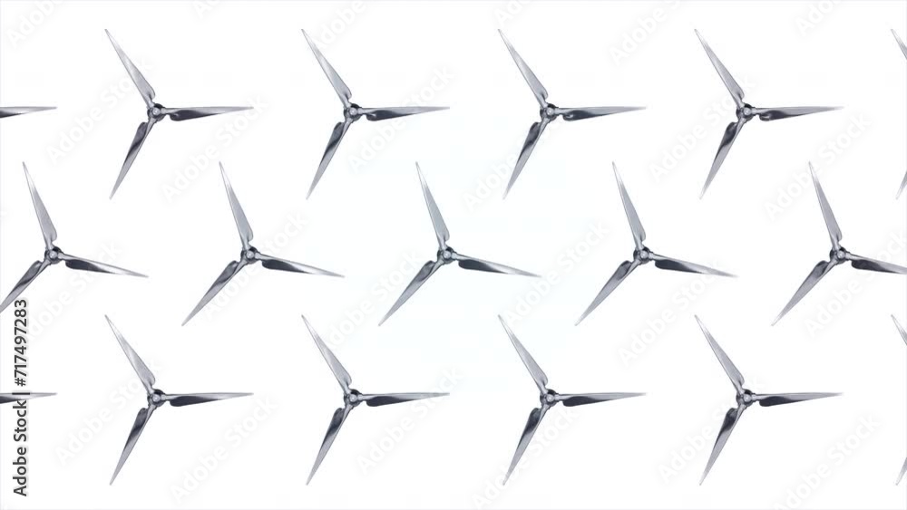 Silver wind turbines rotating in the white background. Wind turbine ...