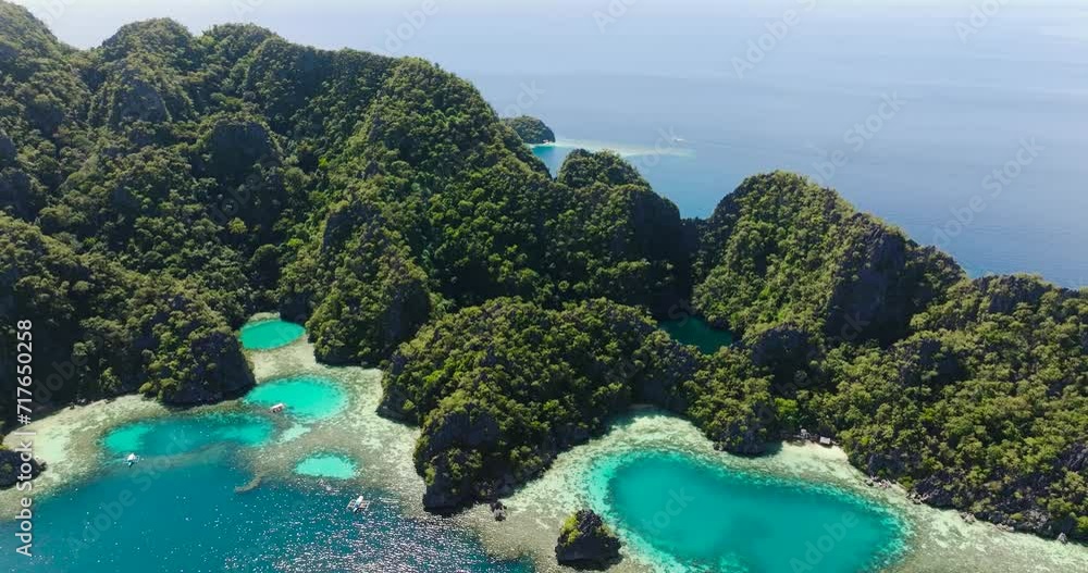 Turquoise lagoon with boats. Hidden Lagoon and Black Lake in Coron ...