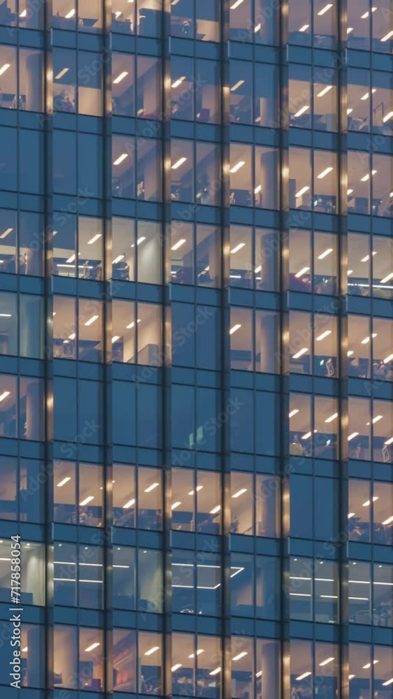 Day to night transition blinking office window lights vertical time ...