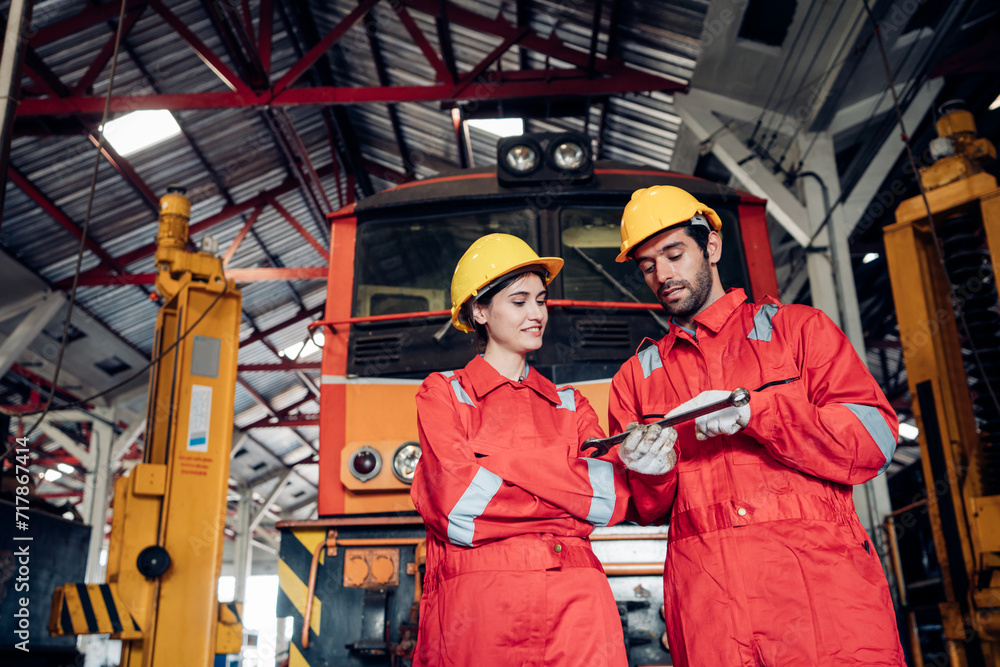 Team of engineer railway wearing safety uniform and helmet under ...