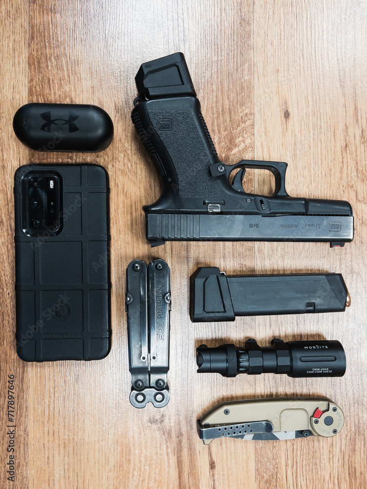 Baltics, January 24, 2024. Tactical edc gear for self defense. Glock 19 ...