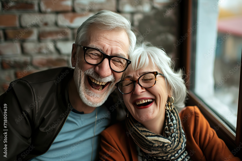 a cute old people couple laughing and having fun in the retirement ...