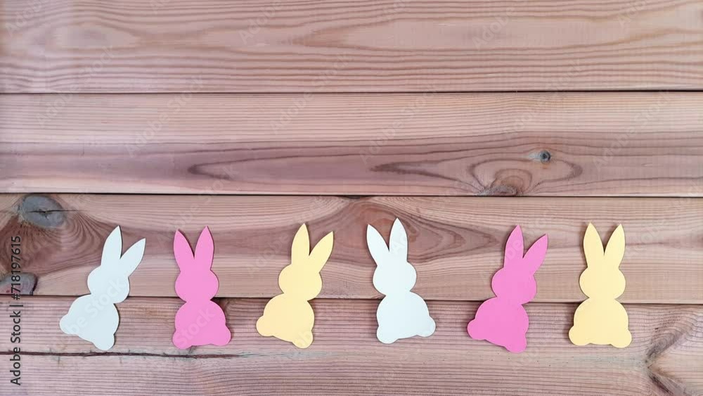 Dance of cute bunnies. Multi-colored dancing rabbits cut out of paper ...
