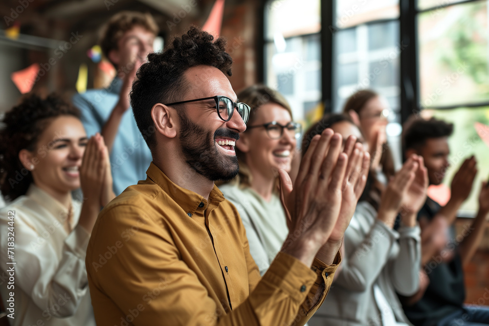 An image capturing the moment of employee recognition with colleagues ...
